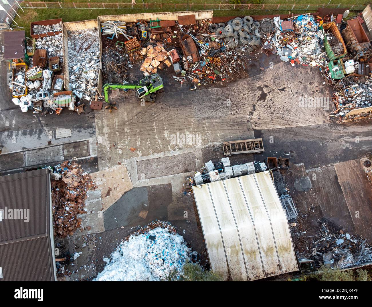 Aerial view on a waste disposal dump in Slovenia. Large piles of metal ...