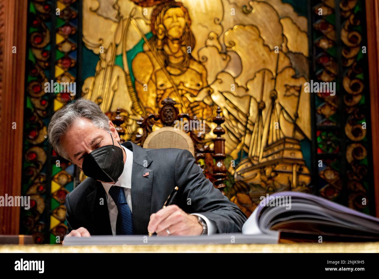 Secretary of State Antony Blinken signs a guest book as he arrives for ...