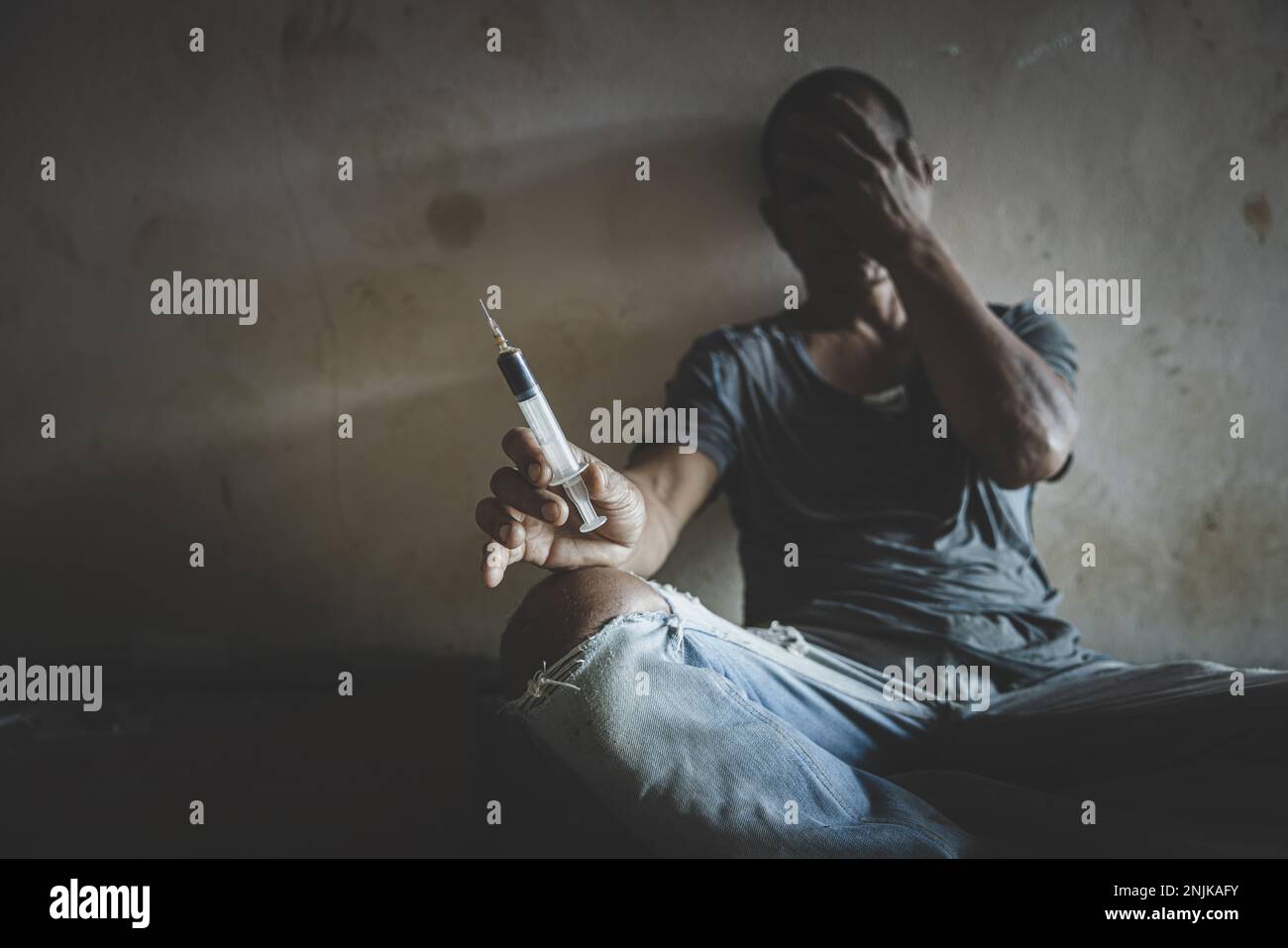 Drugs addiction and withdrawal symptoms concept. Depressed and hopeless ...