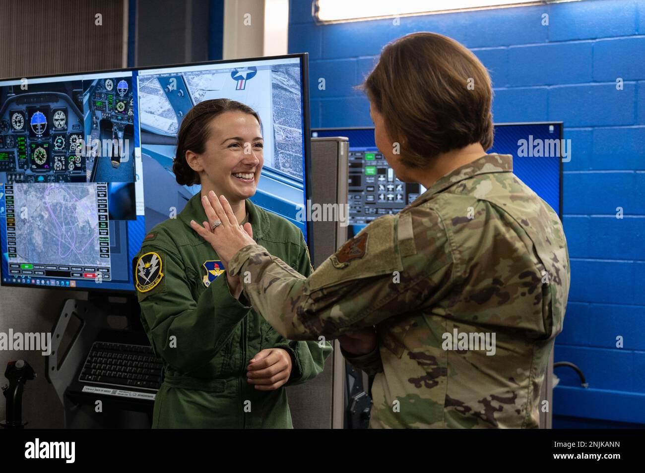 Chief Master Sgt. of the Air Force JoAnne S. Bass (right) speaks with ...