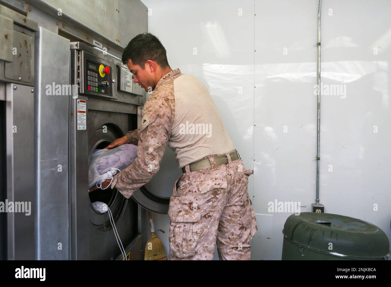 U.S. Marine Corps Lance Cpl. John Naron, a water support technician ...