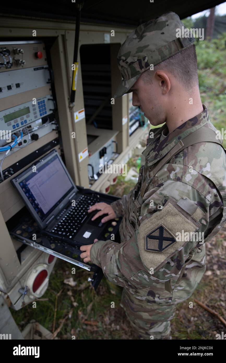Pfc. Lawson Graham, 115 Signal Battalion, monitors signal strength ...