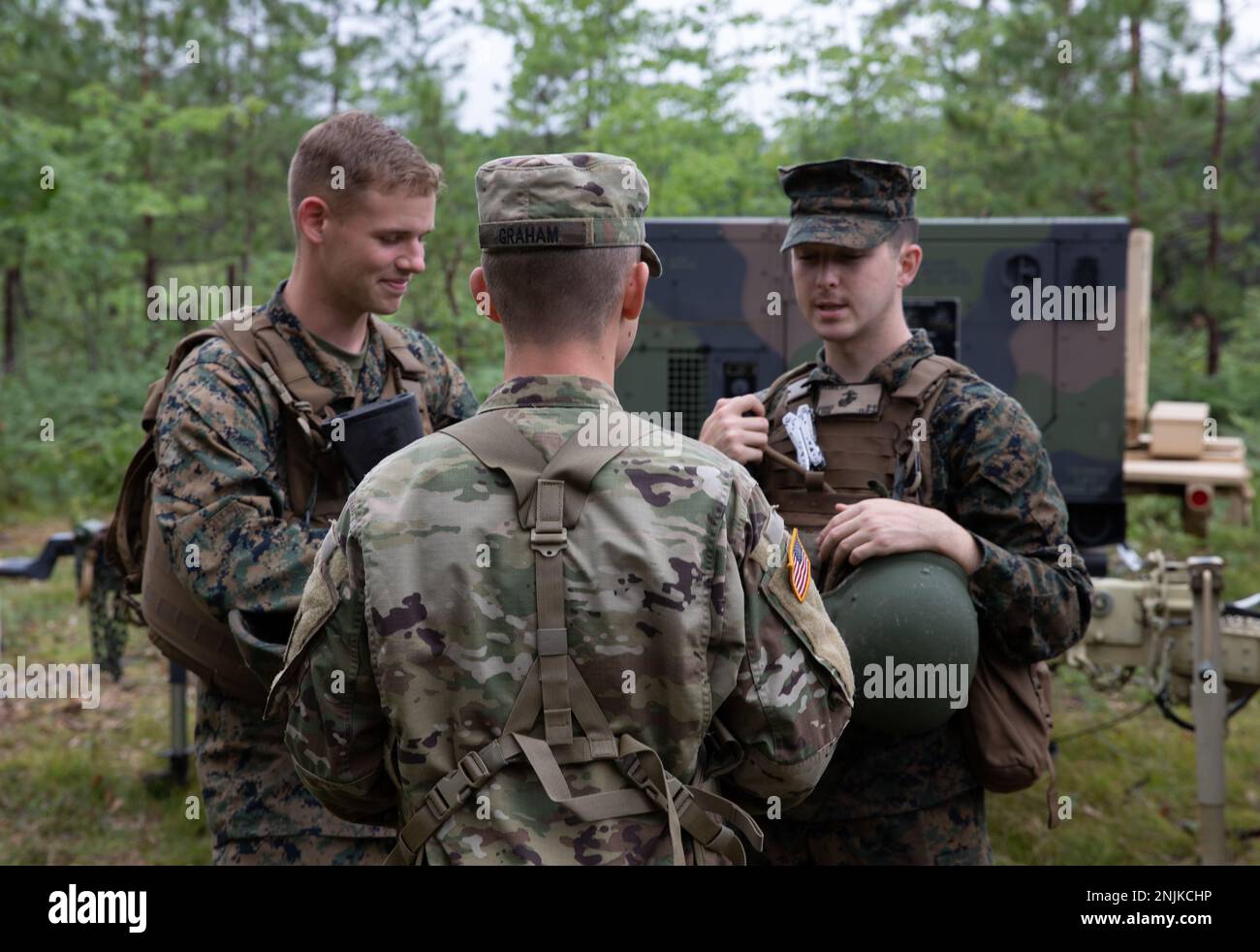 Pfc. Lawson Graham, 115th Signal Battalion, discusses mission details ...