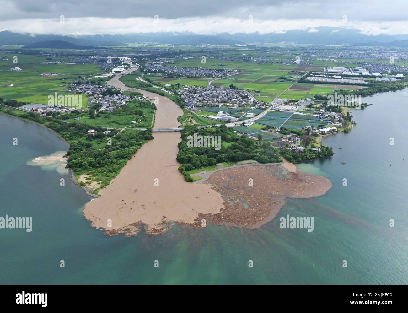An aerial photo shows muddy stream flowing from Ane River into Lake ...