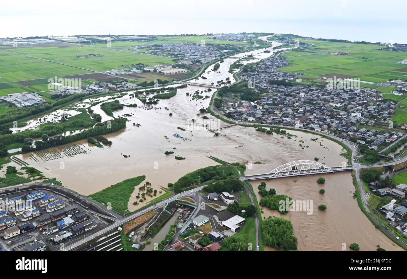 An aerial photo shows Takatoki River flooding due to torrential rain in ...