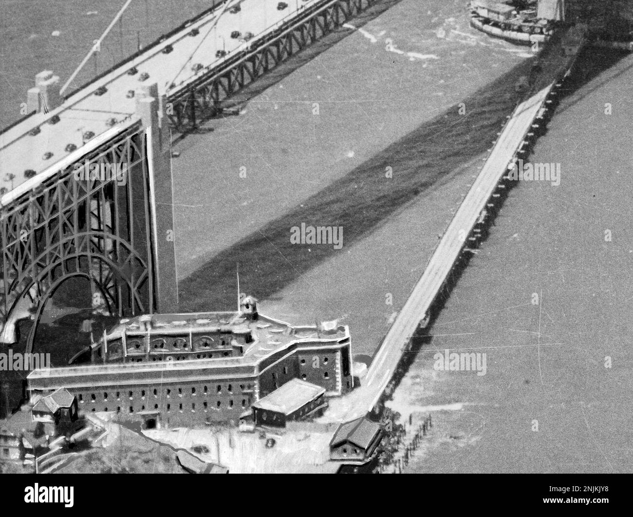 Aerial photo shows Fort Point sitting under the arch supporting the ...