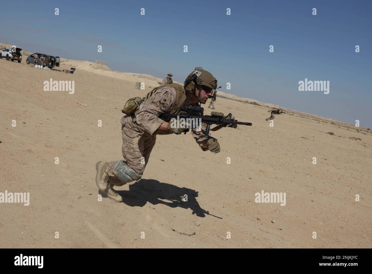 A U.S. Marine with 3rd Air Naval Gunfire Liaison Company, U.S. Marine ...