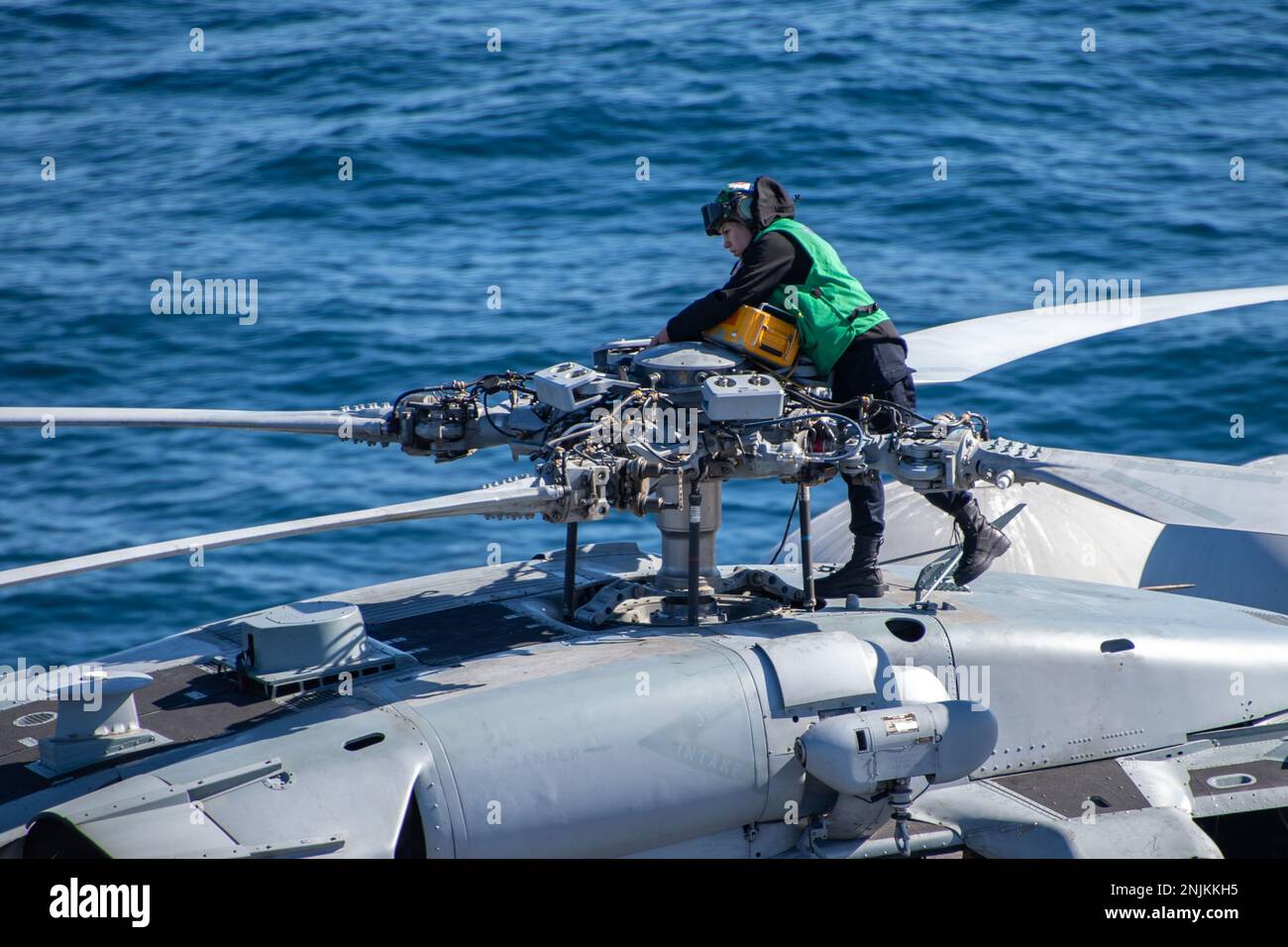 230201-N-EE352-1183 PACIFIC OCEAN (Feb. 1, 2023) A Sailor performs ...