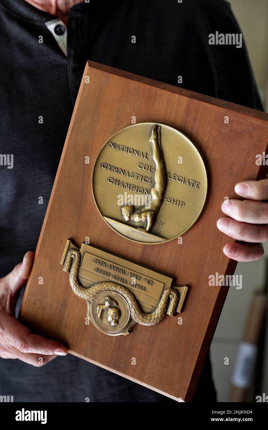 Joshua Robison holds a National Collegiate Gymnastics Championship ...