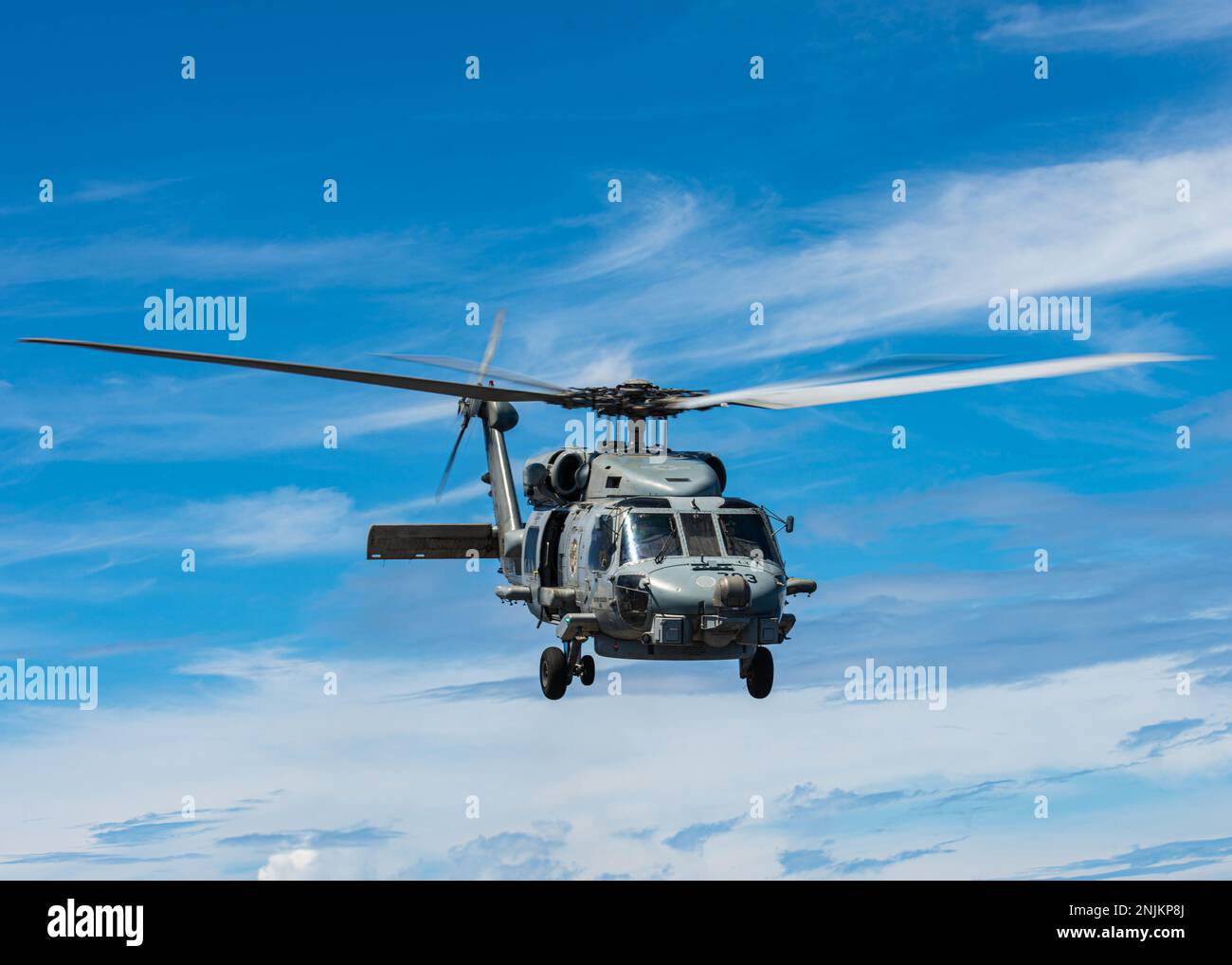 230222-N-MH015-1015 PHILIPPINE SEA (Feb. 22, 2023) An MH-60R Sea Hawk ...