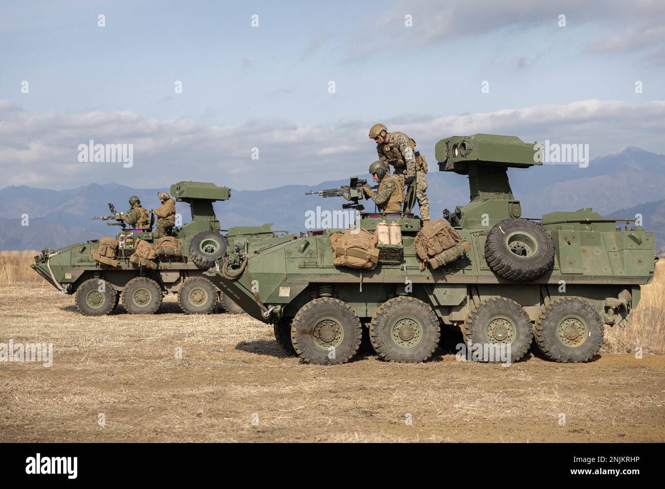 U.S. Marines with 3d Battalion, 4th Marines, prepare to fire M240B ...