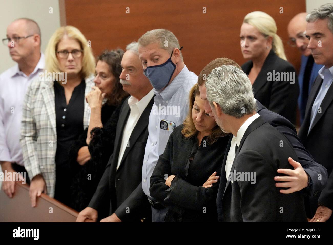 Caryn DeSacia Schachter, third from left, her step-son, Ryan, and ...