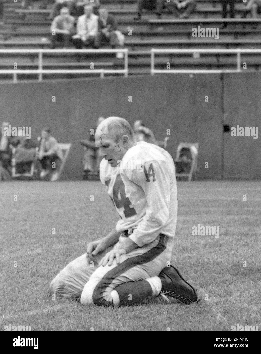 New York Giants quarterback Y.A. Tittle kneels in the end zone at Pitt ...