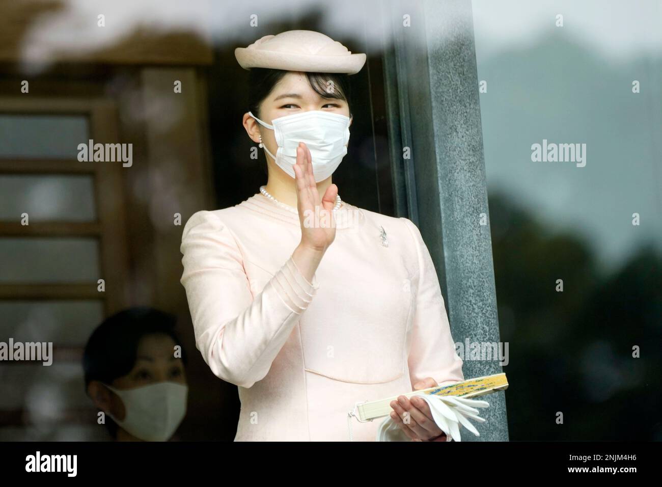 Japan's Emperor Naruhito's daughter Princess Aiko waves at well-wishers ...