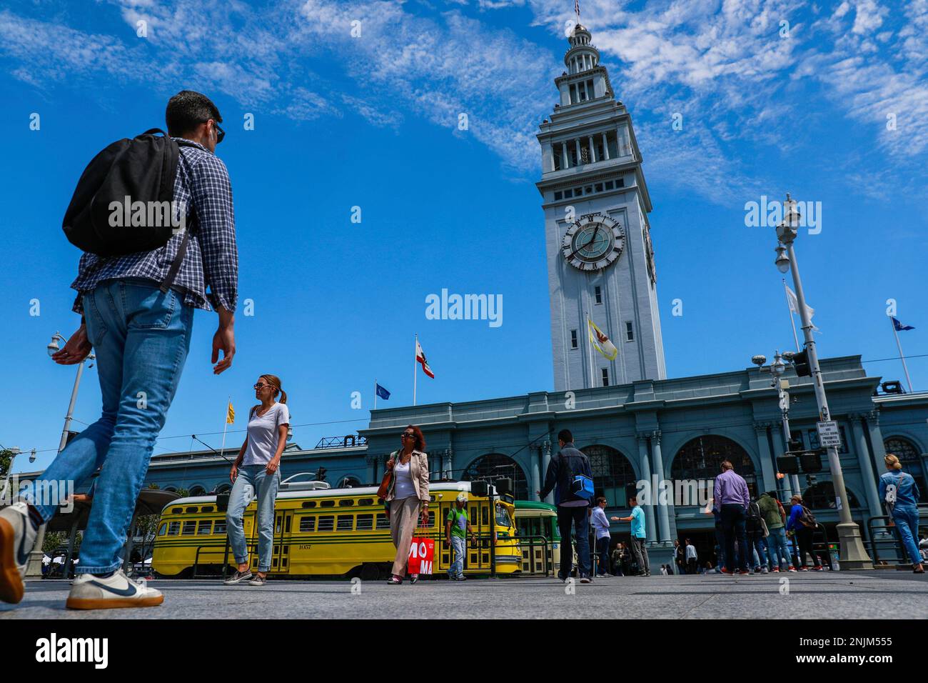 People pass through Harry Bridges Plaza in San Francisco, California ...
