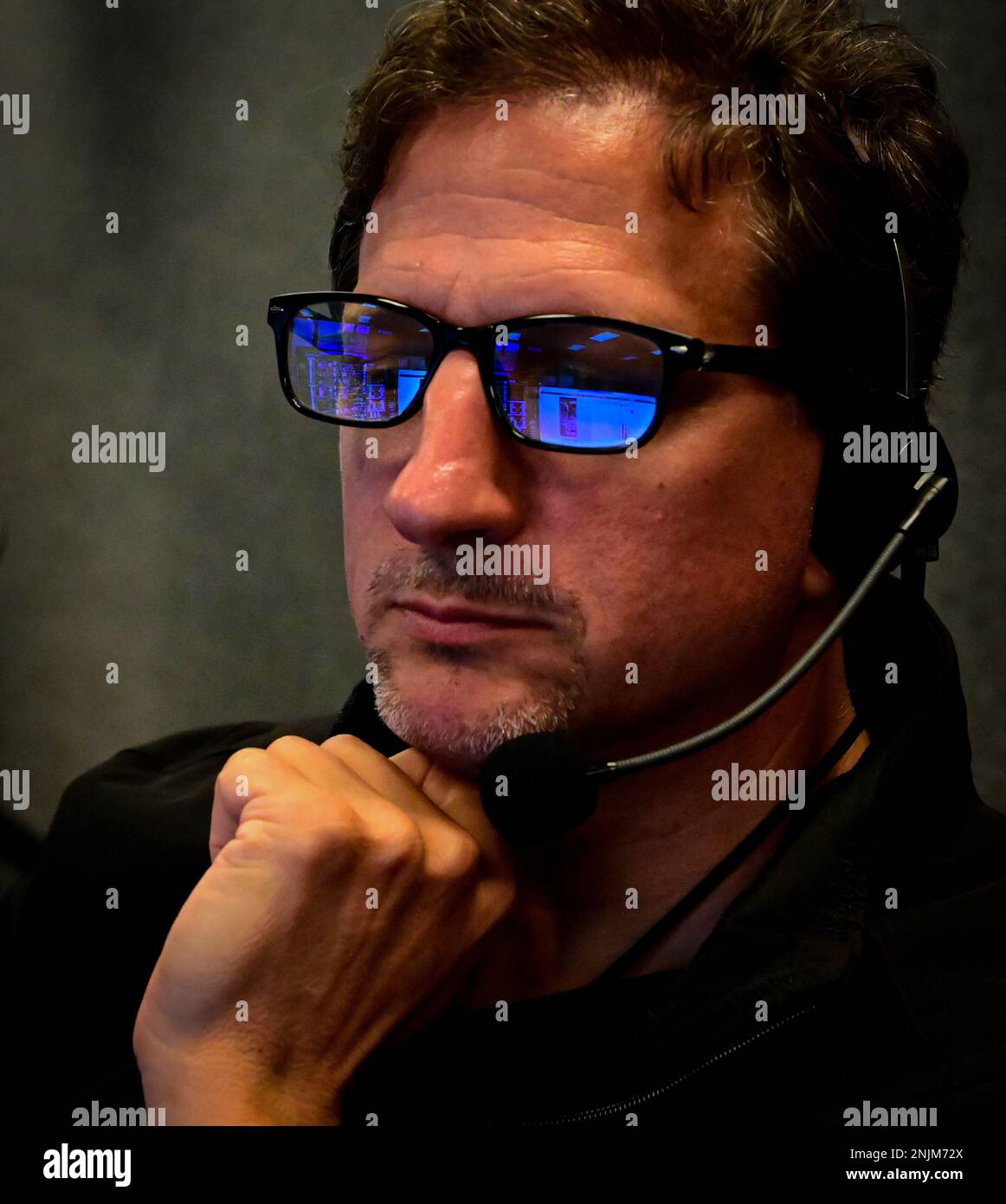 A Firefly Aerospace employee monitors computer data in preparation for ...