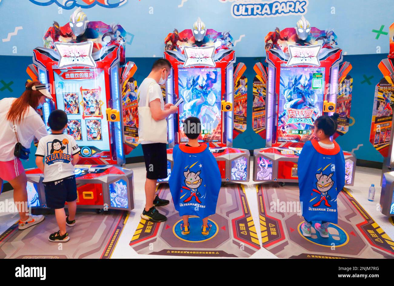 Tourists play in the world's first Ultraman theme park, situated in an ...