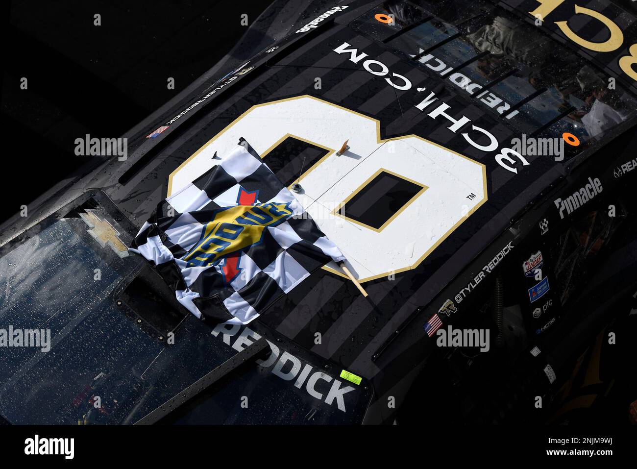 INDIANAPOLIS, IN - JULY 31: A checkered flag lays on the roof of the ...