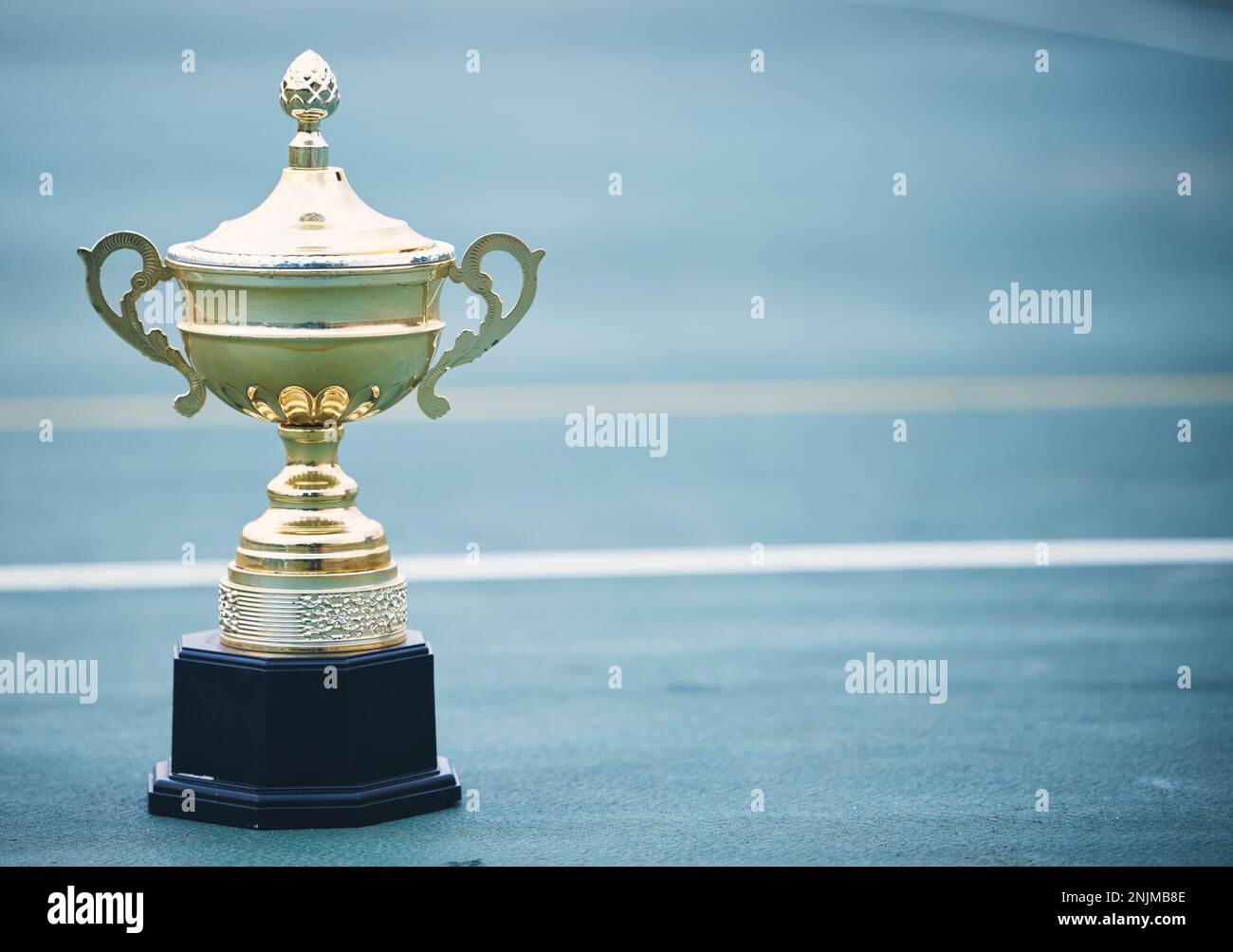 Sports, award and trophy on the floor with no people at court for ...