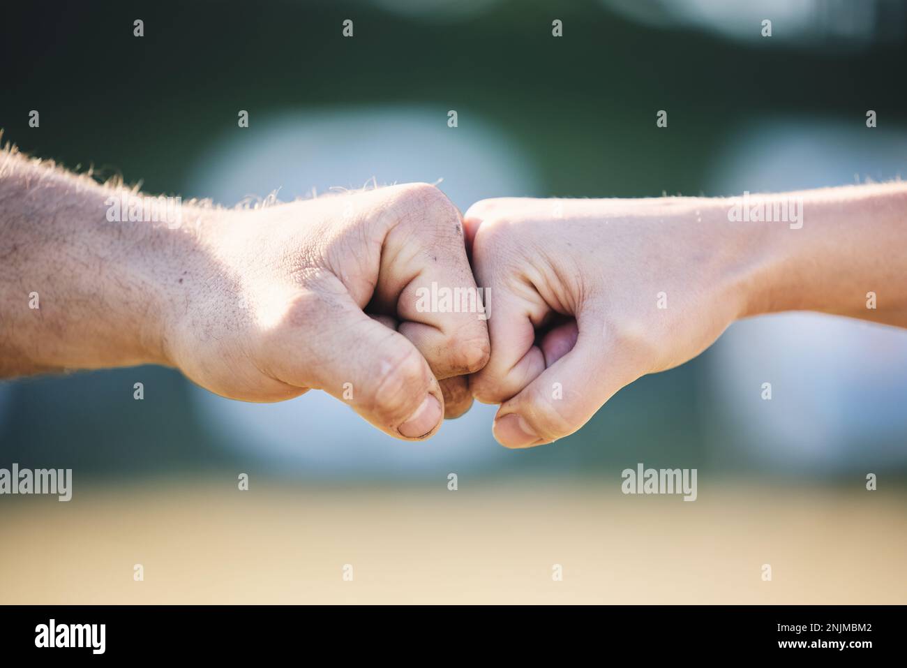 Fist bump, hands and outdoor with touch, teamwork and greeting for ...