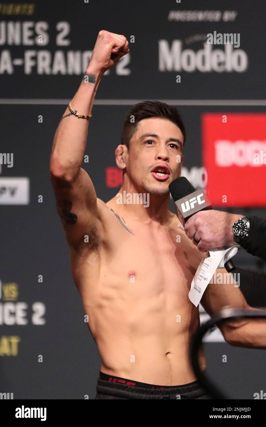 DALLAS, TX - JULY 29: Brandon Moreno speaks to Joe Rogan after the ...