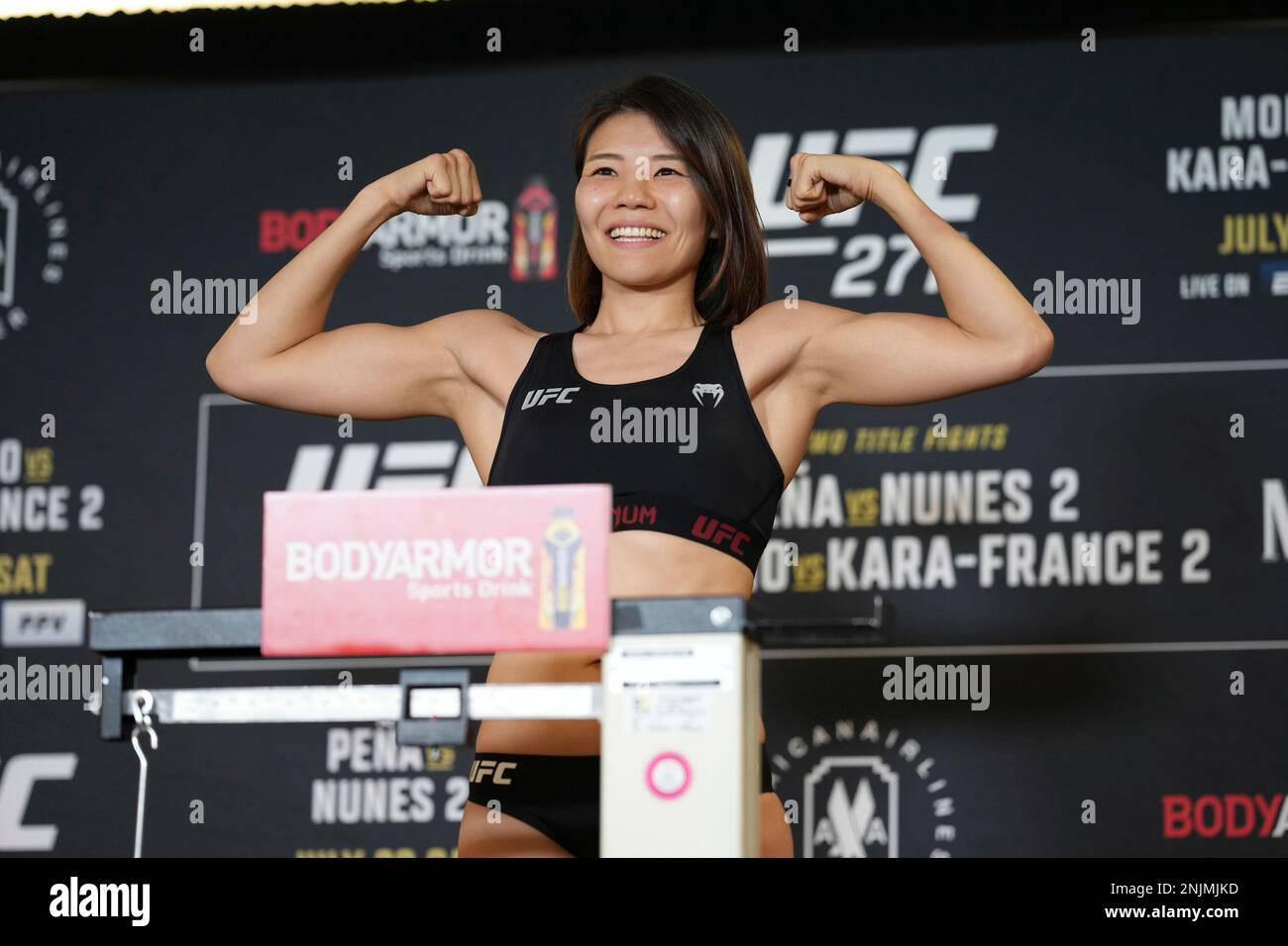 DALLAS, TX - JULY 29: Ji Yeon Kim steps on the scale for the official ...