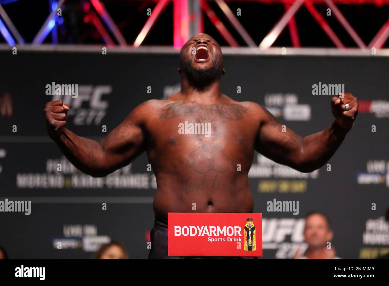 DALLAS, TX - JULY 29: Derek Lewis steps on the scale for the ceremonial ...