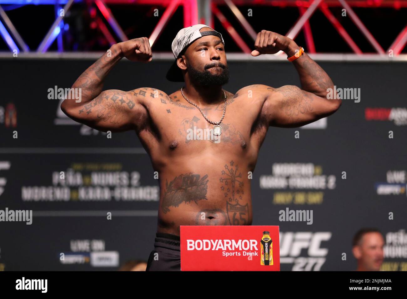 DALLAS, TX - JULY 29: Don'tale Mayes steps on the scale for the ...