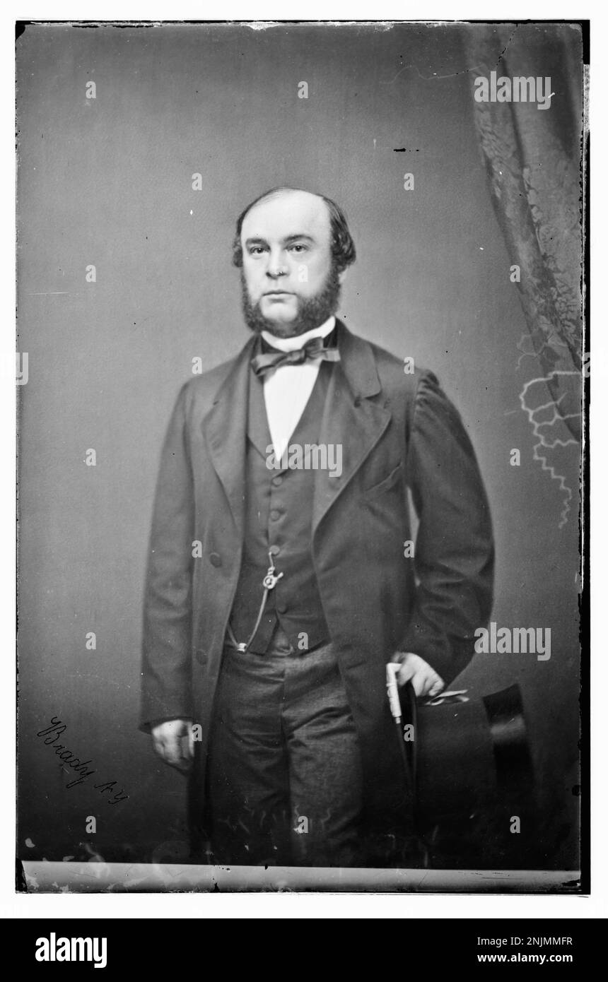 August Belmont, a financier and political figure, captured in a formal ...