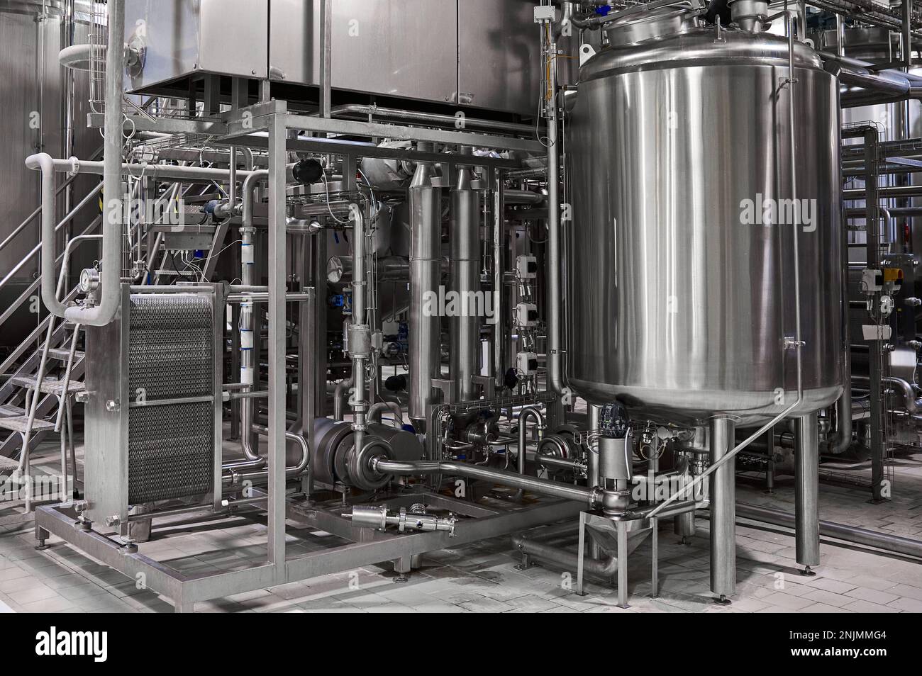 Pipeline system for fermented milk products making at plant Stock Photo ...