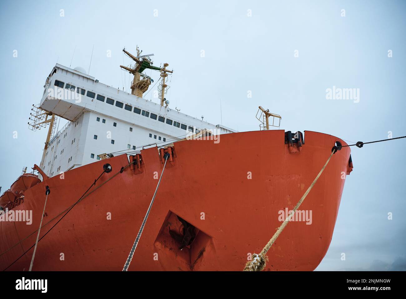 Orange icebreaker is moored in the seaport Stock Photo - Alamy