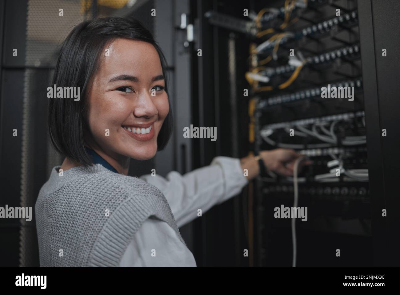 Asian woman, portrait smile and technician by server for networking ...