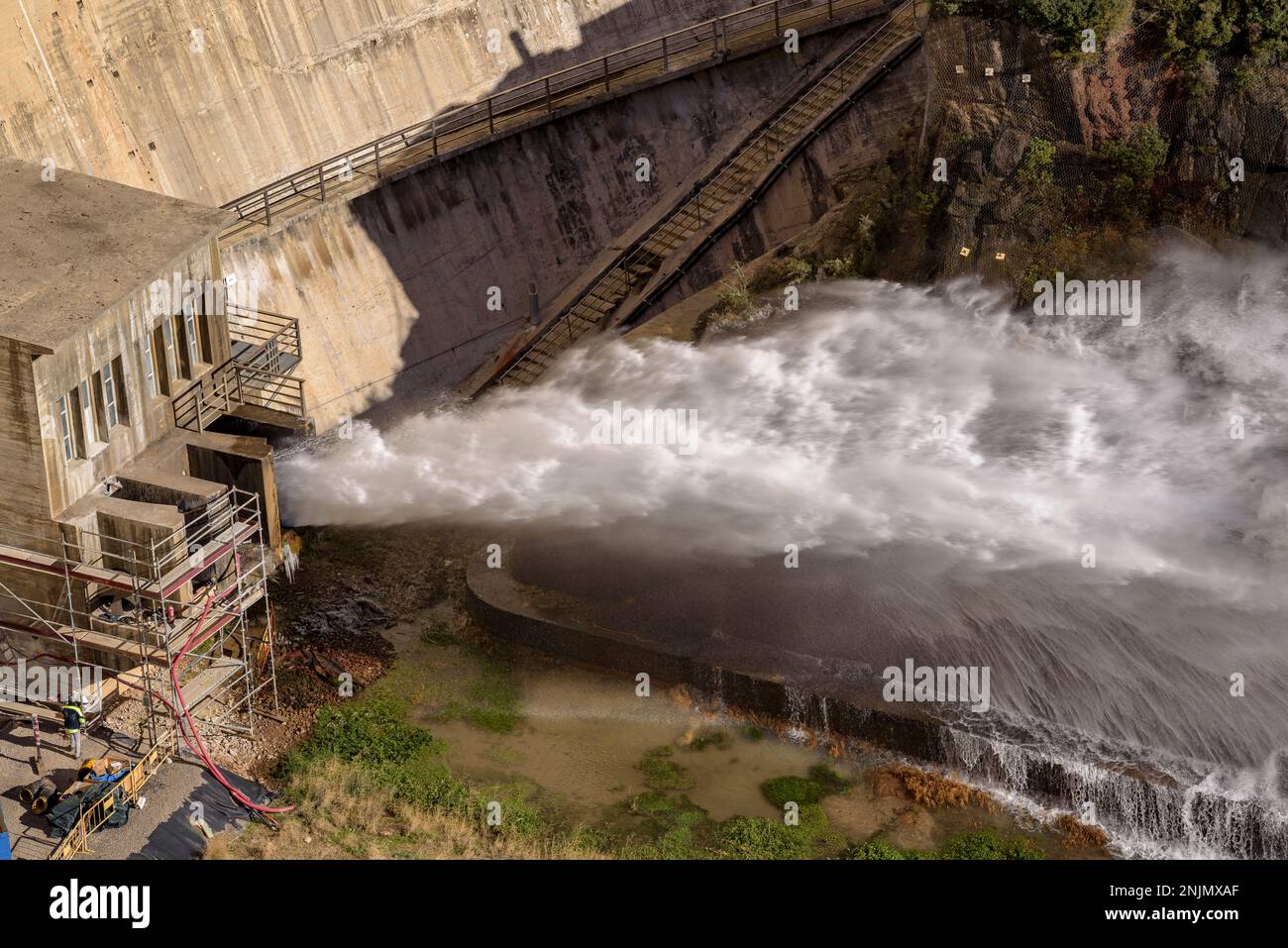 Lower spout of the dam of the Baells reservoir that lets water out into ...