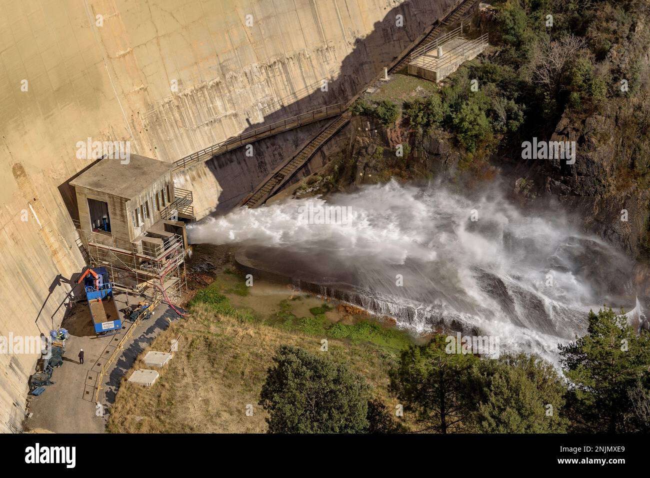 Lower spout of the dam of the Baells reservoir that lets water out into ...