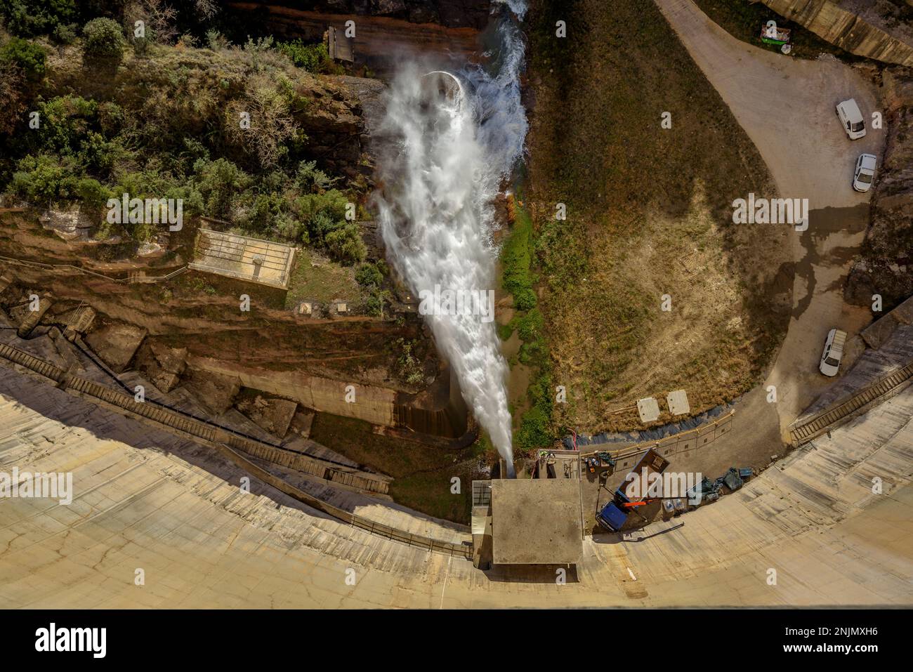 Lower spout of the dam of the Baells reservoir that lets water out into ...