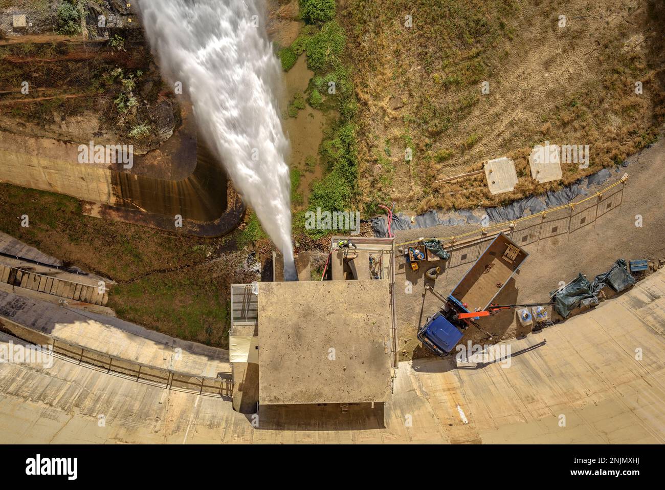 Lower spout of the dam of the Baells reservoir that lets water out into ...