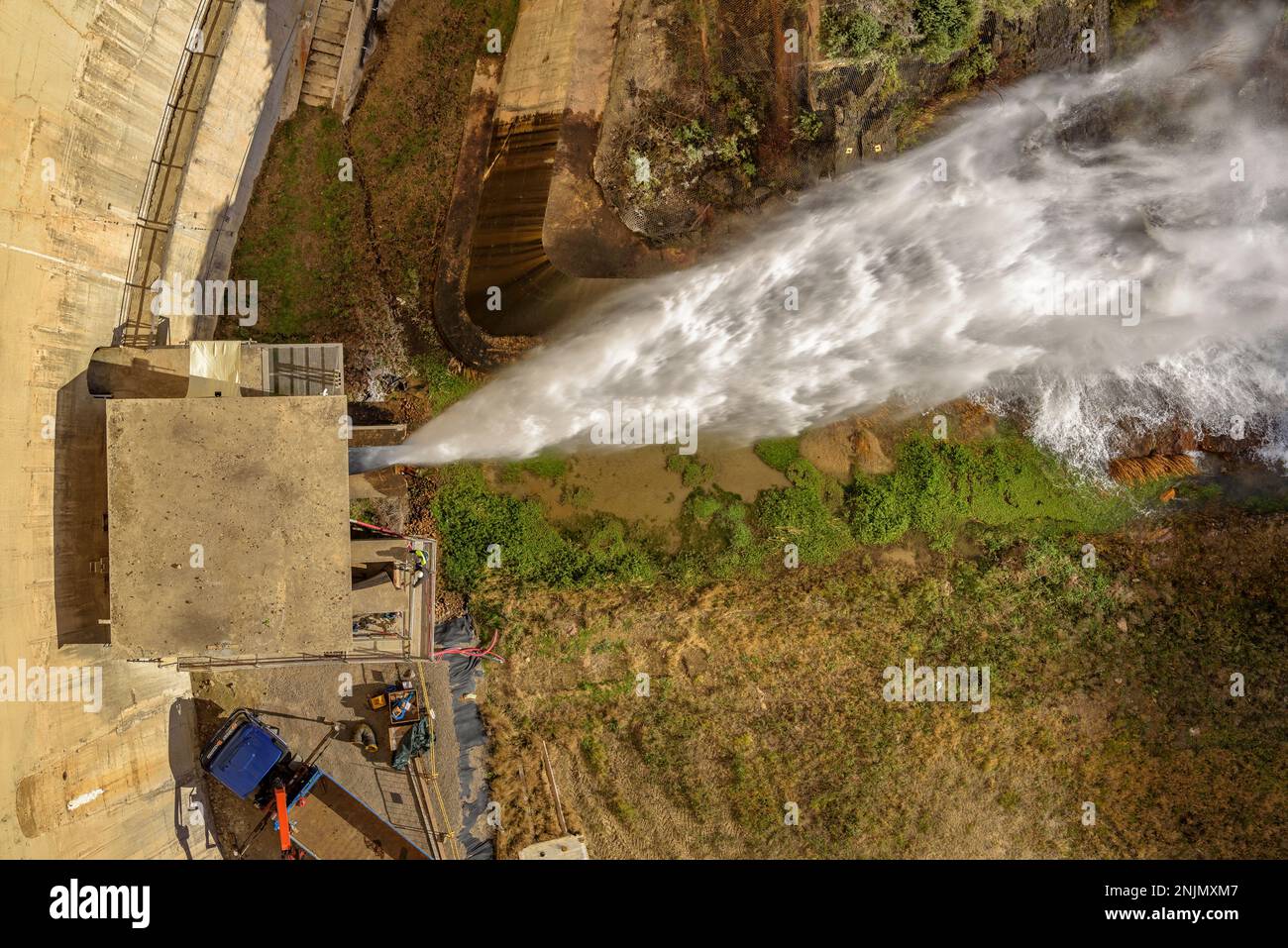 Lower spout of the dam of the Baells reservoir that lets water out into ...