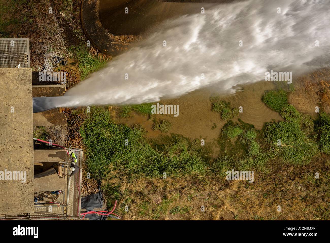 Lower spout of the dam of the Baells reservoir that lets water out into ...