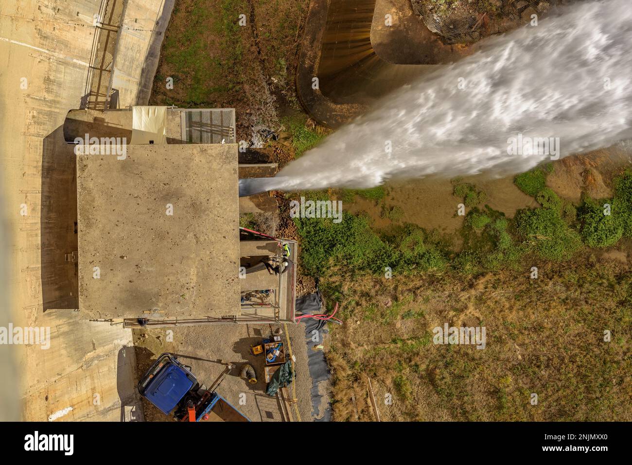 Lower spout of the dam of the Baells reservoir that lets water out into ...