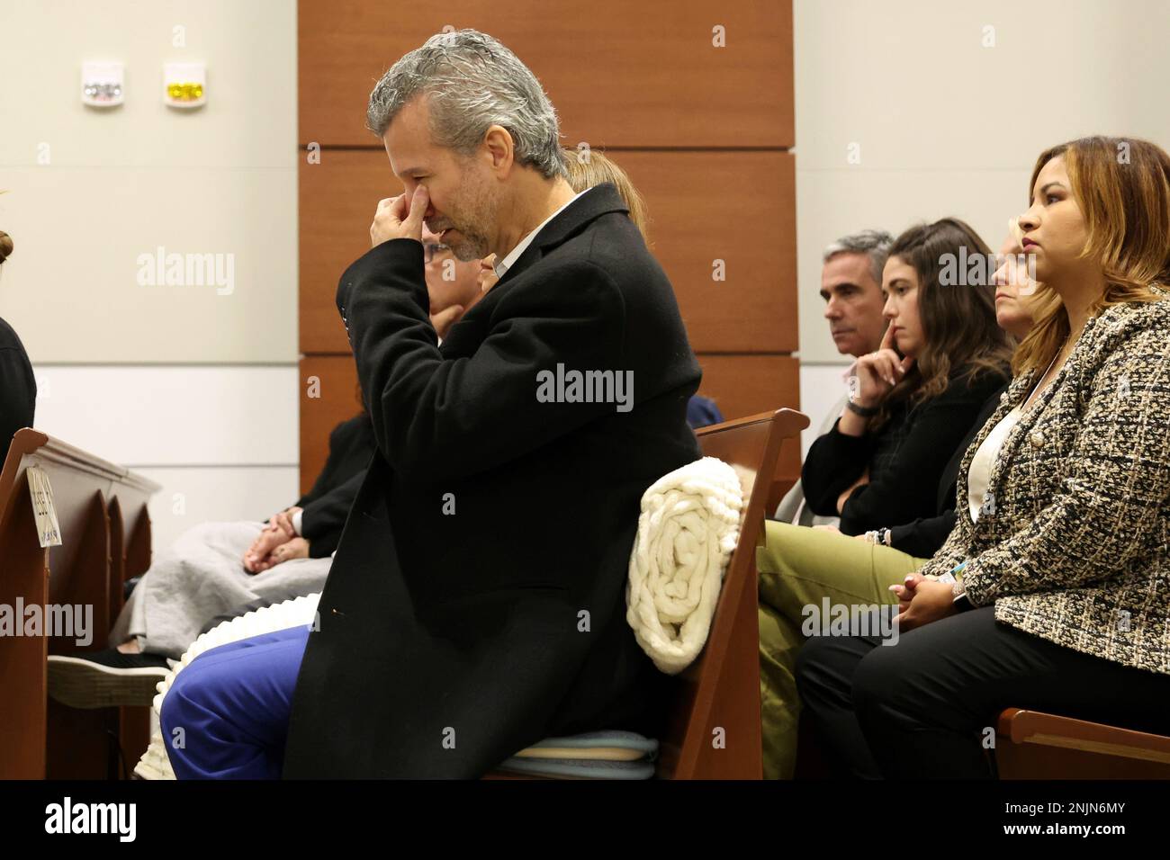 Max Schachter, the father of victim Alex Schachter, reacts as Dr ...