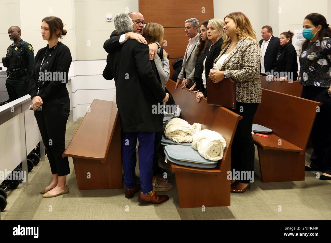 Max Schachter, the father of victim Alex Schachter, is hugged by Fred ...