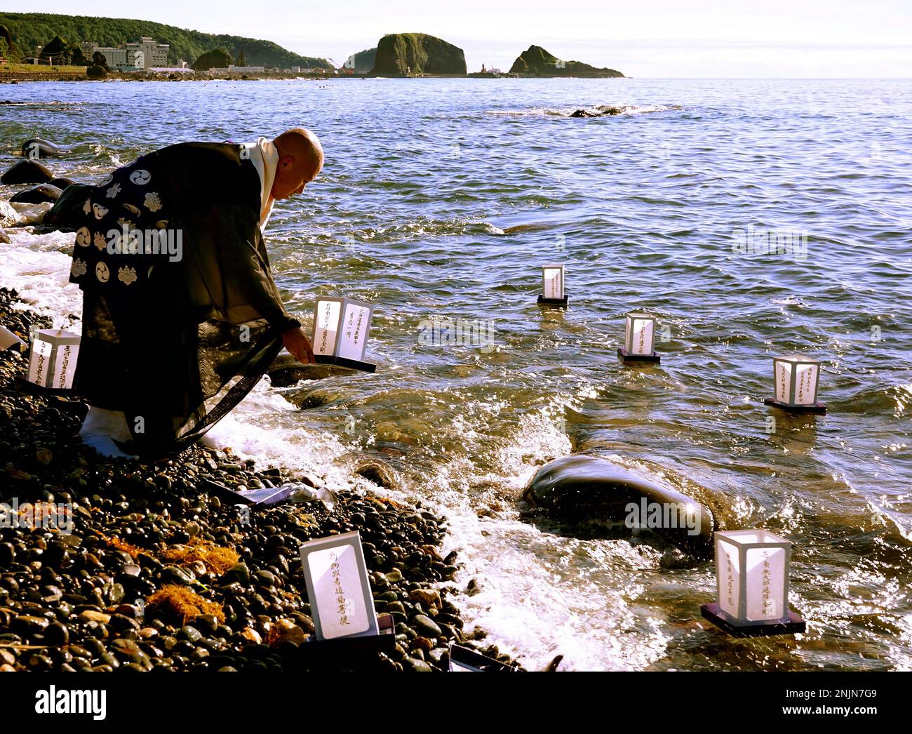 Buddhist monks chant sutra recitation for the victims of the sunken ...