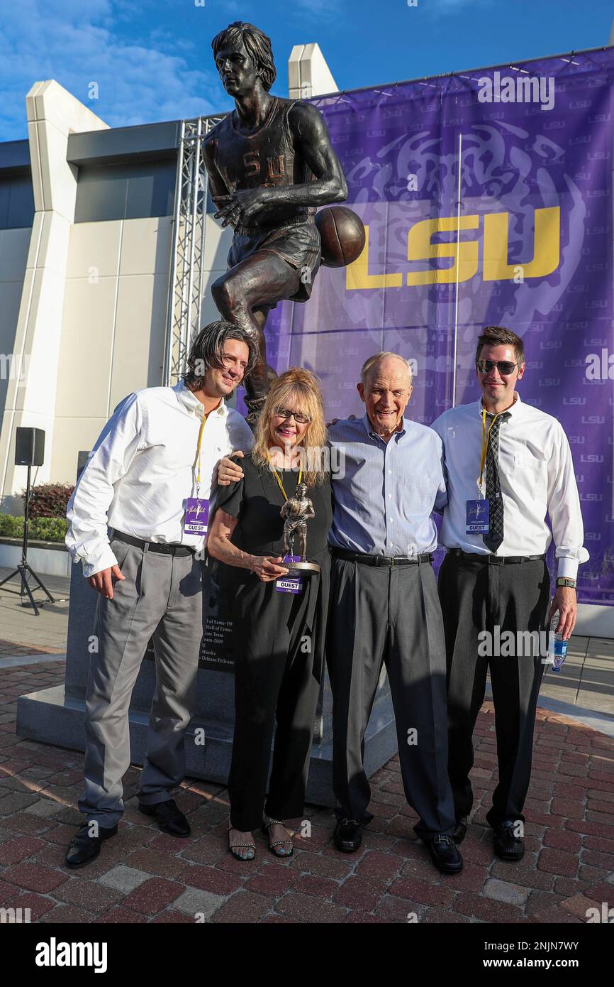 July 25, 2022: Jackie Maravich poses with the new statue with her son's ...