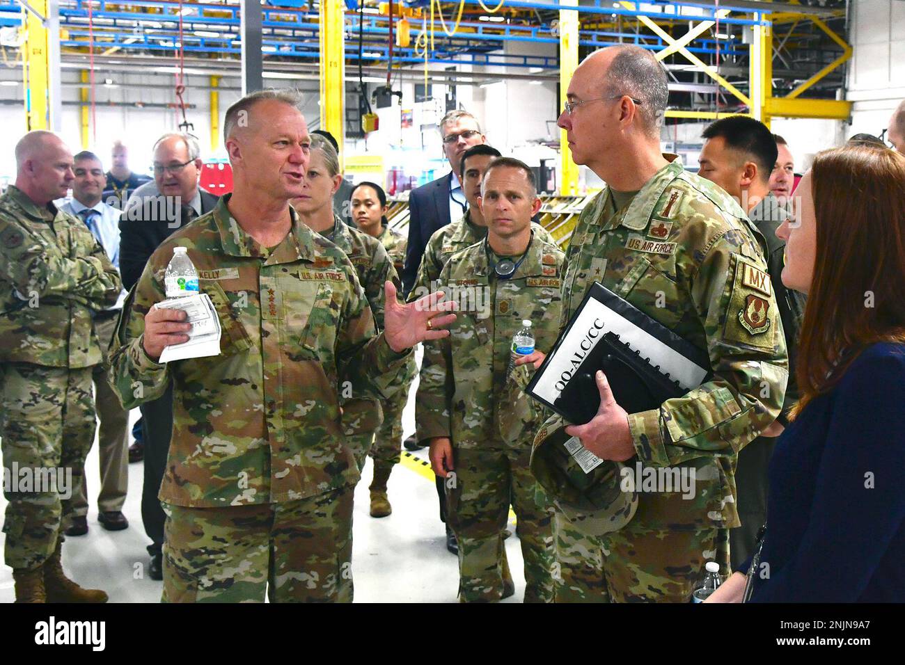 Gen. Mark D. Kelly (left), Air Combat Command commander, speaks with ...