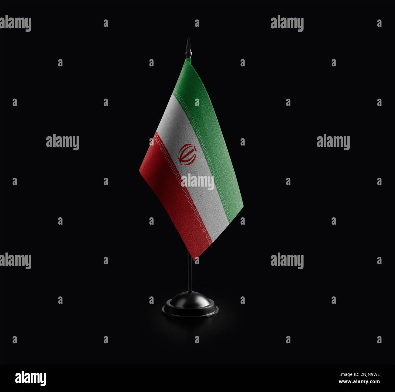 Small national flag of the Iran on a black background Stock Photo - Alamy