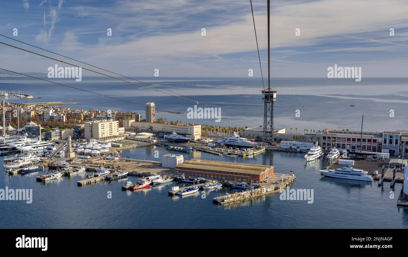 Old Harbor (Port Vell) of Barcelona seen from the port cable car on a ...
