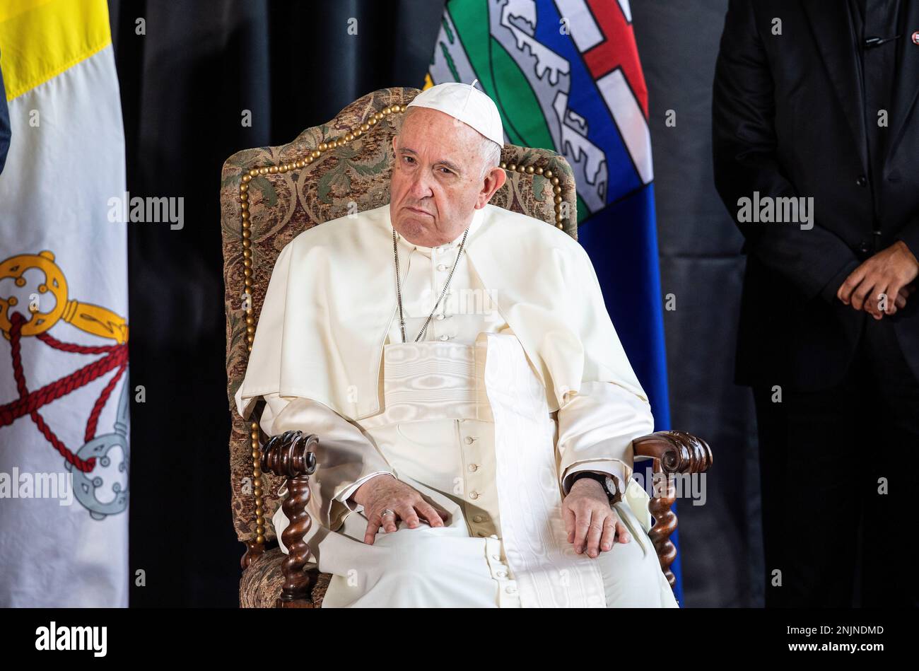 Pope Francis looks on after arriving at the Edmonton International ...