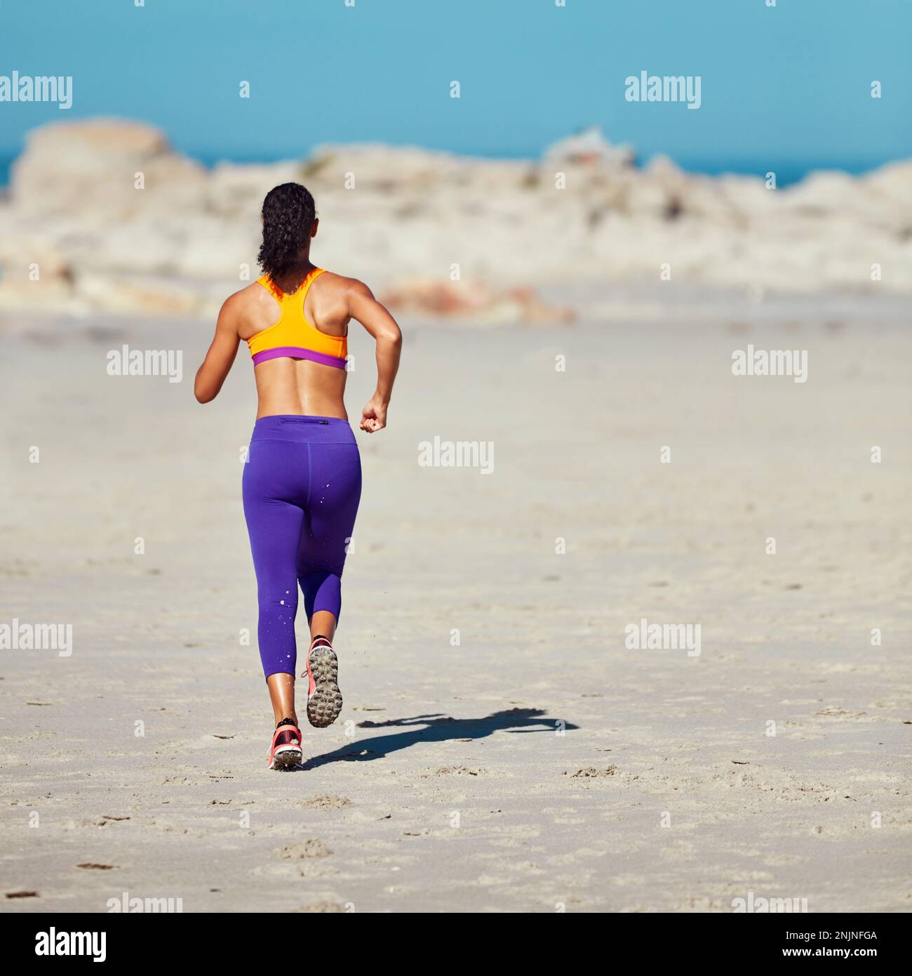 You will never regret reaching your goal. a sporty young woman out at ...