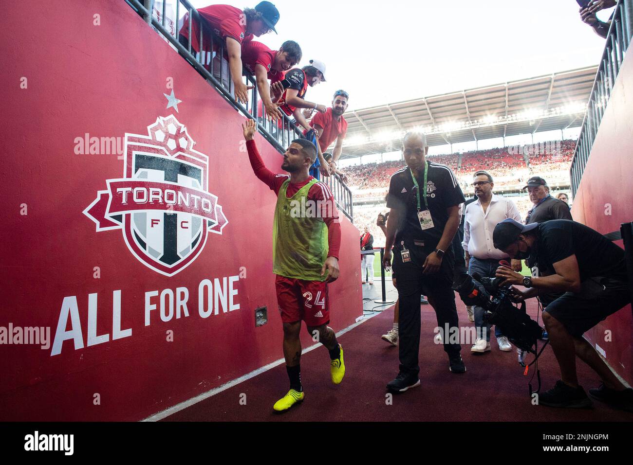 Toronto FC's Lorenzo Insigne (24) greets fans as he returns to the ...