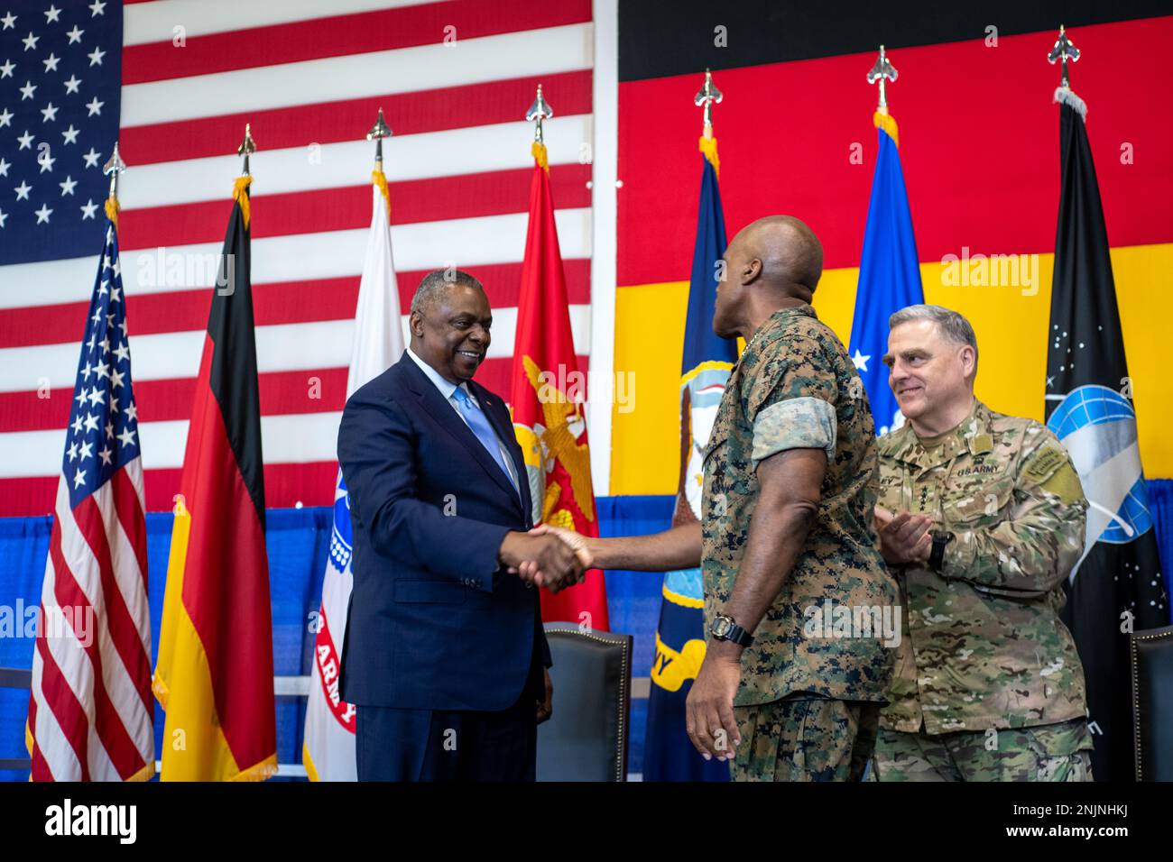 Secretary of Defense Lloyd J. Austin III shakes hands with U.S. Marine ...